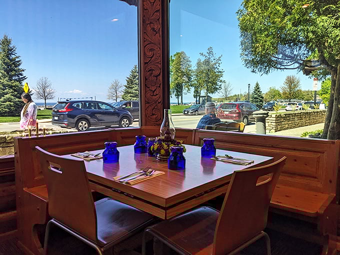 Window-side dining with a view of Sister Bay makes every meal feel like a special occasion. Blue glassware catches the light like tiny Swedish sapphires.