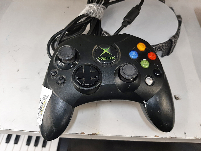Xbox controllers waiting patiently to reconnect with their gaming destiny and your couch.