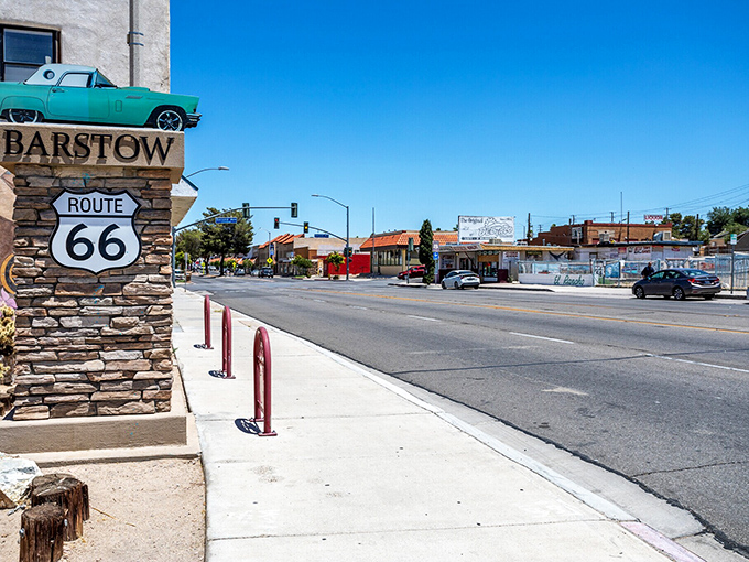 Route 66 runs through Barstow like a river of nostalgia - that classic car knows exactly where it belongs. 