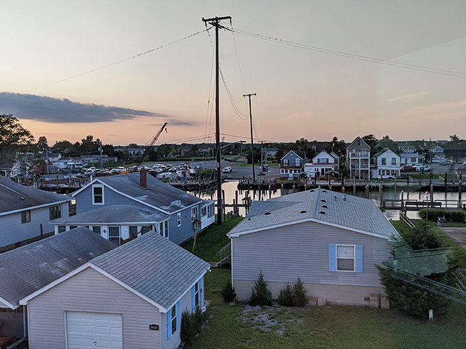Bowers Beach houses huddle together like old friends sharing stories, each one perfectly positioned for bay views.