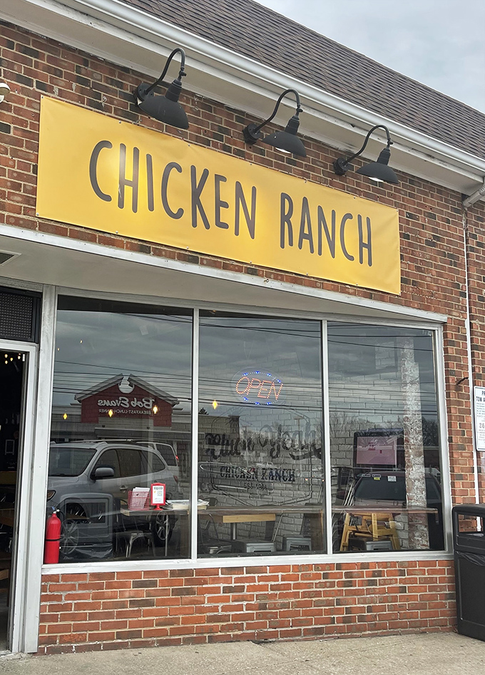 That cheerful yellow sign promises sunshine on a plate - and their chicken delivers warmth in every golden bite.