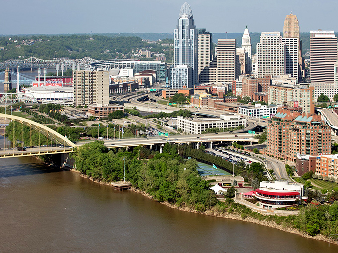 Cincinnati's skyline reflects in the Ohio River like a queen admiring herself in nature's mirror.