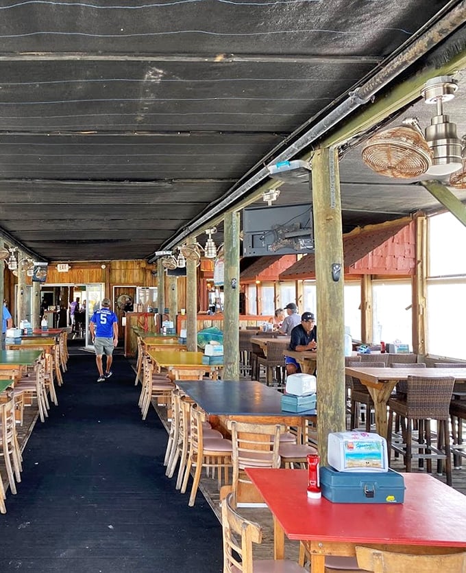 Crabby Joe's wooden deck hovers over the Atlantic like a magic carpet ride with crab legs. 