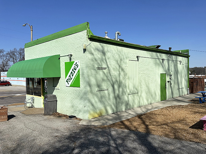 Bright green buildings announce serious sandwich business with the kind of confidence that comes from experience.