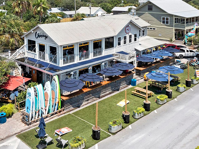 Chiringo's surfboard fence announces you've found Grayton Beach's favorite spot for post-beach refreshments and people-watching.