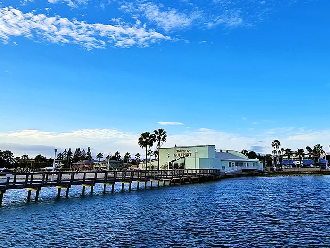 Gulfport's waterfront charm offers affordable coastal living with colorful buildings, swaying palms, and peaceful blue waters.