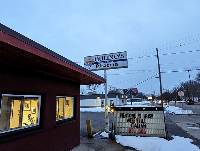 Gulino's humble exterior belies the generational pizza wisdom and Bay City tradition waiting inside those doors.