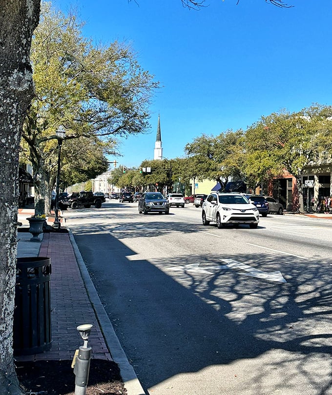 Tree-shaded streets create natural cooling systems in towns that understand life's simple pleasures.