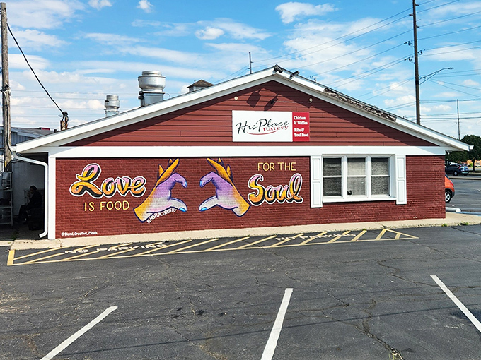 "Love is Food for the Soul" mural speaks the truth! His Place Eatery's vibrant exterior hints at the flavor explosion waiting inside.