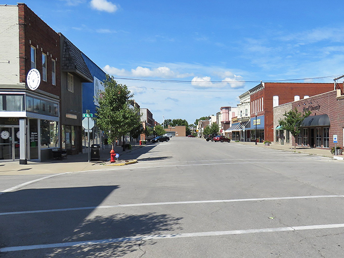 This main street scene captures the essence of Midwest living, where neighbors still wave and businesses know your name.