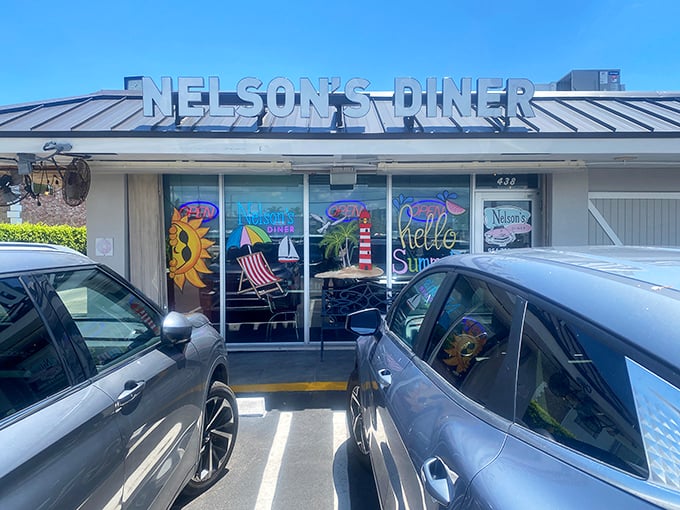 Colorful window signs tell the whole story: authentic diner food served with genuine pride and care.
