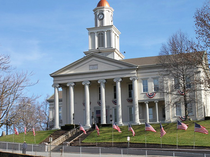New Castle's courthouse stands proud, anchoring a community where neighbors still wave from porches.