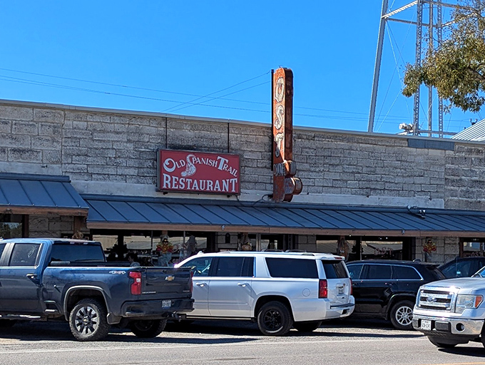 Stone walls and weathered signs tell stories of countless satisfied appetites and strong morning coffee.