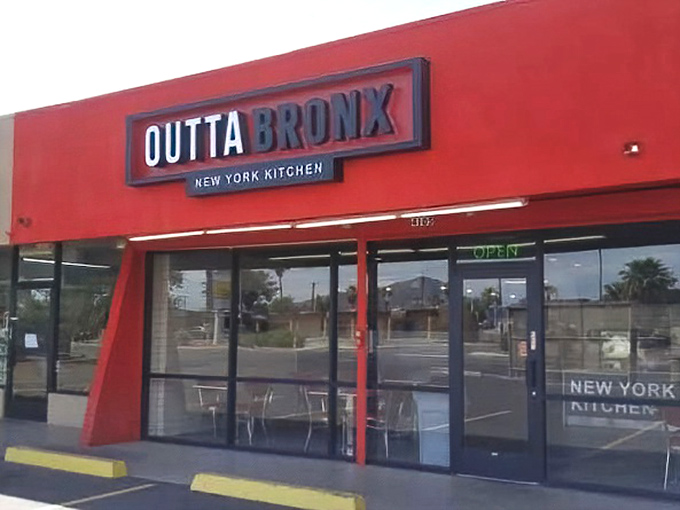 Bold red storefront announces New York attitude has officially landed in the Arizona desert.