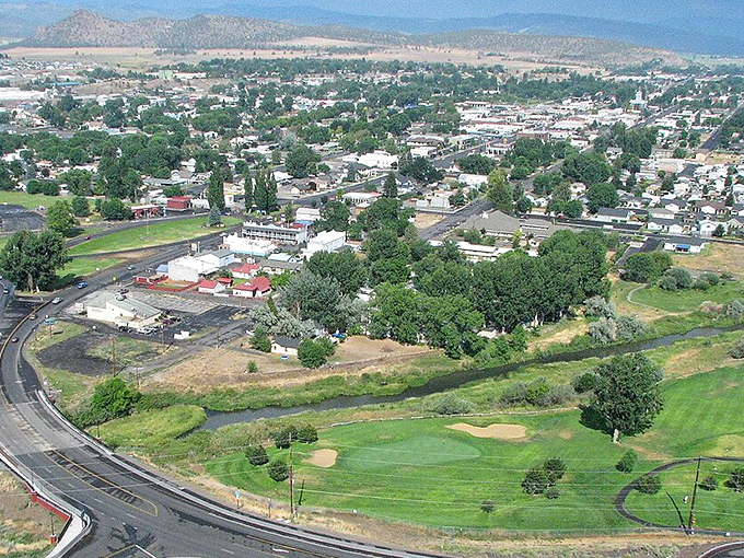 This aerial view reveals a town that's grown just right, big enough for comfort, small enough for savings.