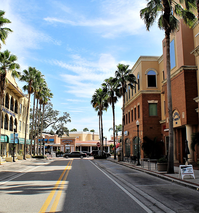 Palm trees line the colorful streets of Safety Harbor, where Mediterranean architecture creates a charming small-town atmosphere perfect for leisurely exploration.