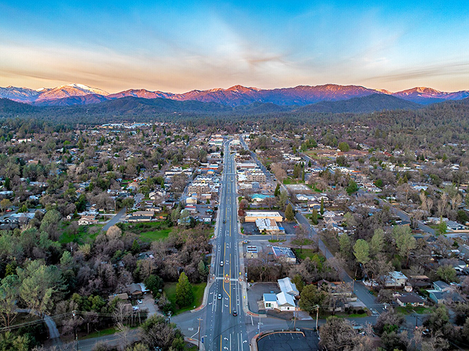 Shasta Lake's crystal waters wind through canyon walls like nature's own scenic highway.