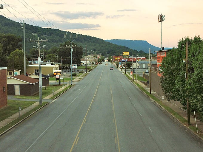 Evening settles over South Pittsburg with quiet streets, welcoming charm, and mountain views creating a peaceful small town atmosphere.