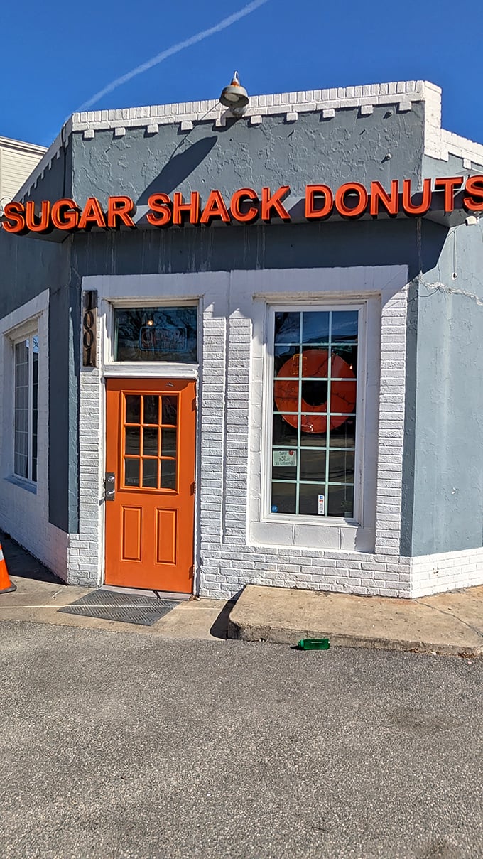 The castle-like design with that bright orange door makes this Richmond spot absolutely unforgettable and charming.