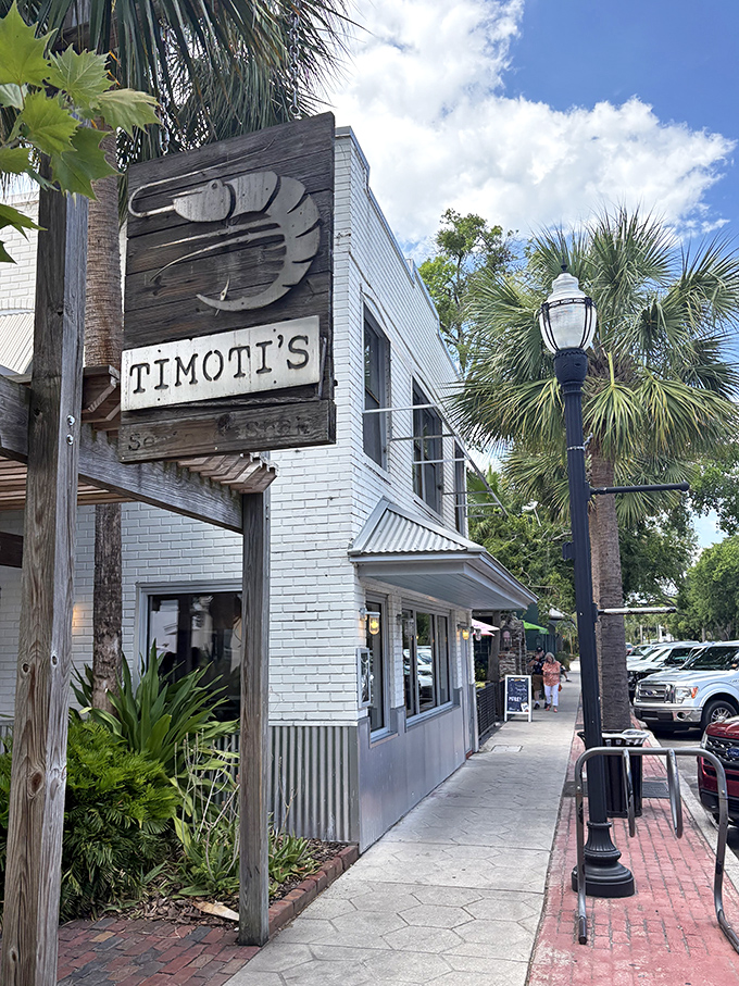 Timoti's wooden shrimp sign swinging in the breeze is like a seafood bat-signal for hungry locals. Answer the call.