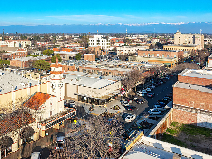 Visalia's downtown FOX marquee still glows with promise&mdash;while those snow-capped Sierra sentinels remind you skiing's just a day trip away!