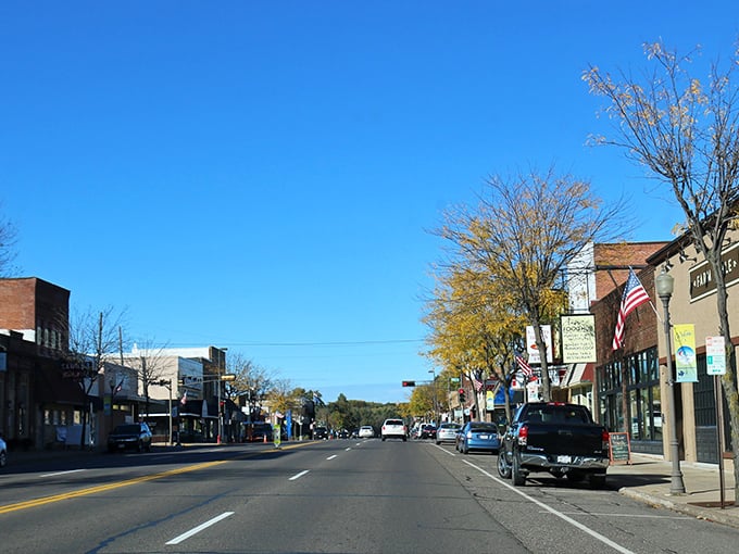 These autumn-kissed streets invite leisurely exploration of local shops and friendly neighborhood cafes.