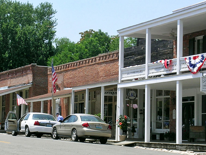 Arrow Rock's historic storefronts with their patriotic bunting celebrate America's heartland heritage with genuine small-town pride.