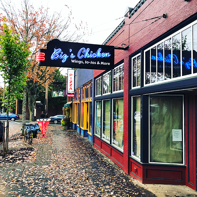 Colorful storefront energy matches the bold flavors waiting inside this neighborhood chicken haven.