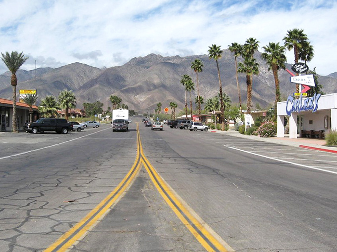 Palm-lined streets and mountain backdrops create an oasis where retirement dreams become affordable reality.