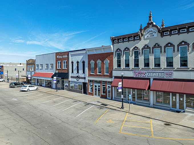 Historic storefronts maintain their dignity while adapting to modern needs and contemporary expectations.