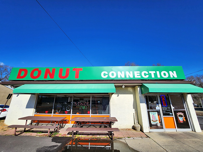 Bright blue skies frame this unpretentious donut institution where consistency trumps trendiness every delicious time.