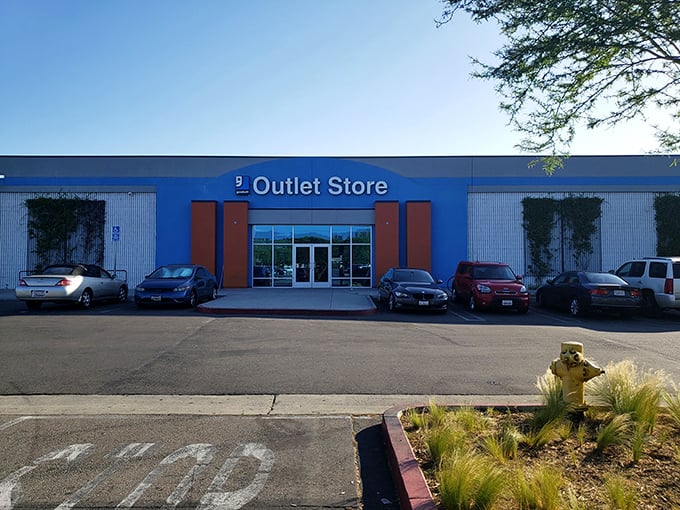 The blue and orange entrance of Goodwill's LA campus stands ready for donation drop-offs. Every item given here begins its journey to a new home.