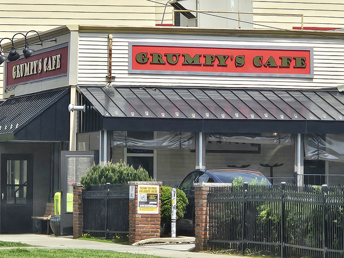 That red sign and welcoming storefront prove you can't judge a cafe by its grumpy name.