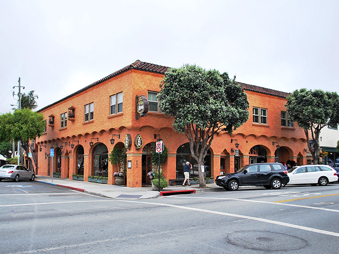 Historic building stands guard over miles of pristine coastline where horses still gallop through surf.