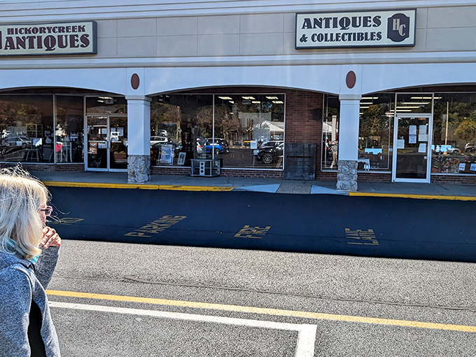 A shopper contemplates her next move at Hickory Creek. That feeling when you're one purchase away from becoming a collector!