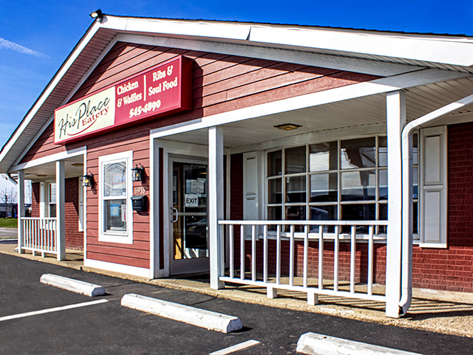 His Place Eatery's welcoming red facade and porch promise comfort food that hugs your soul while delighting your taste buds.