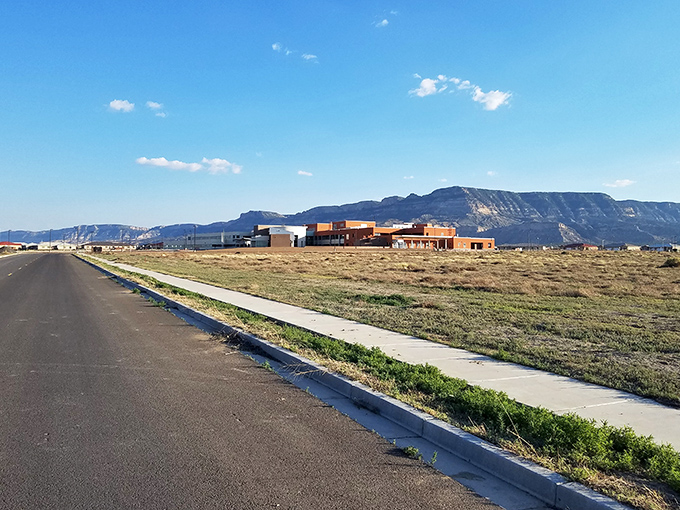 The path to affordability in Kayenta stretches toward modern buildings and ancient mesas, where development hasn't yet driven up the cost of desert living.