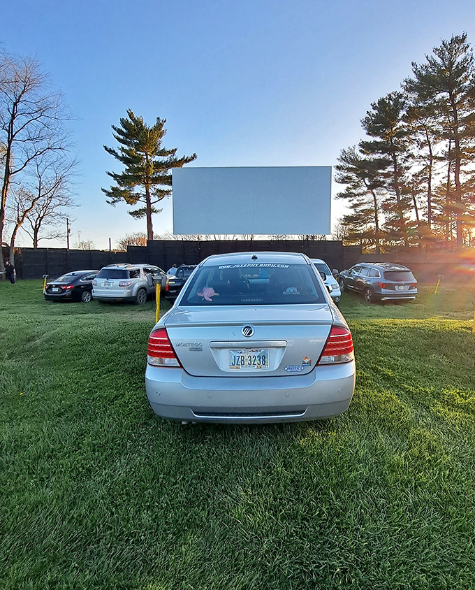 Rolling hills frame the perfect movie night where nature provides the ultimate theater backdrop.
