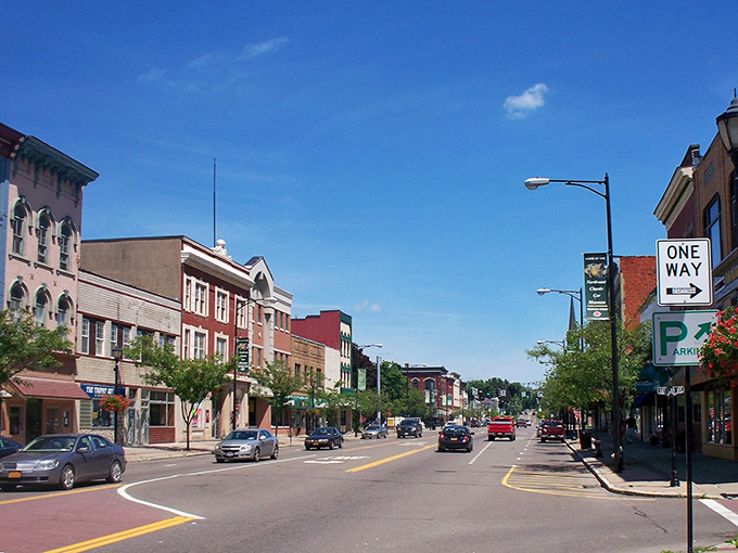 Norwich's historic buildings frame a street where budget-conscious shoppers thrive. Architectural grandeur without the grand expense!