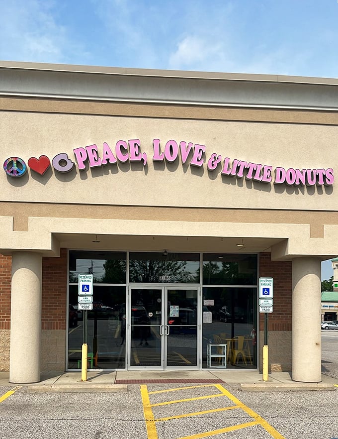 This cheerful storefront radiates good vibes and the promise of warm, made-to-order mini donut magic