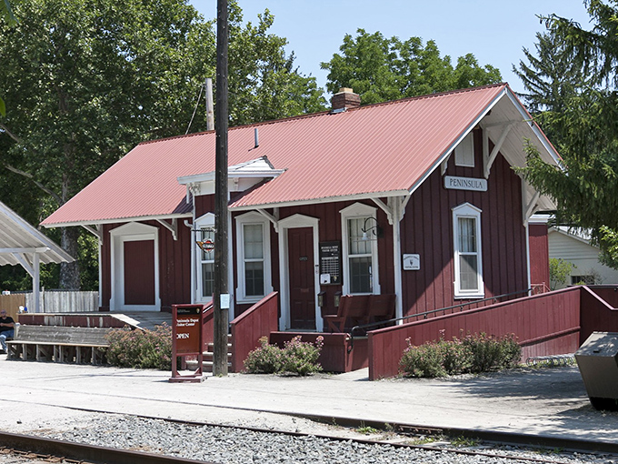 This charming red depot welcomes travelers just like it did when steam engines ruled the rails.