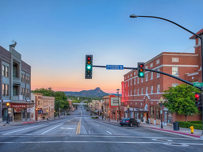 Prescott: Downtown at dusk when the magic happens. That mountain silhouette in the distance is worth stopping for.