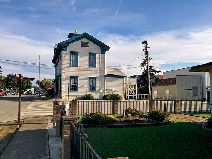 This stunning historic home in San Juan Bautista, with its crisp white siding and blue trim, is a picture-perfect postcard.