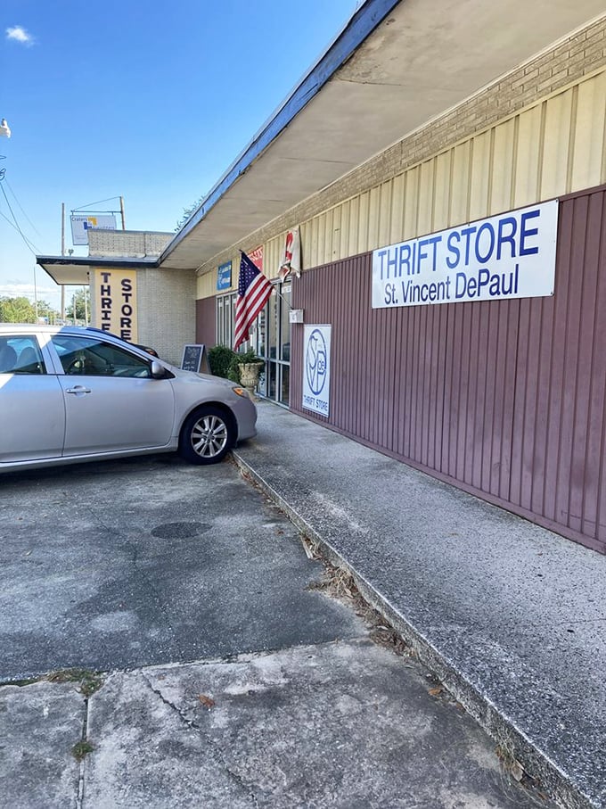 The American flag waves proudly outside this community-focused thrift store. Patriotic shopping that helps your neighbors!