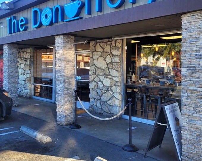 The velvet rope treatment suggests these aren't just donuts - they're an experience worth waiting for patiently.