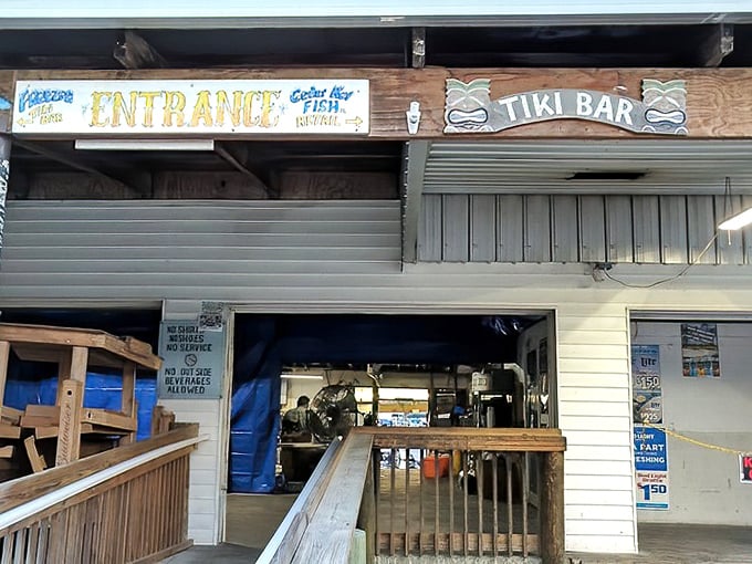 "Entrance" and "Tiki Bar" - two simple words that promise an authentic Florida experience where seafood reigns supreme.