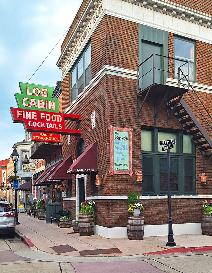 Classic steakhouse signage on historic Main Street - where every meal comes with a side.