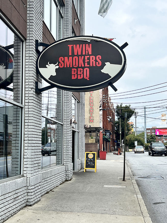 Classic signage announces twin smokers working overtime to create the kind of ribs that downtown dreams about.