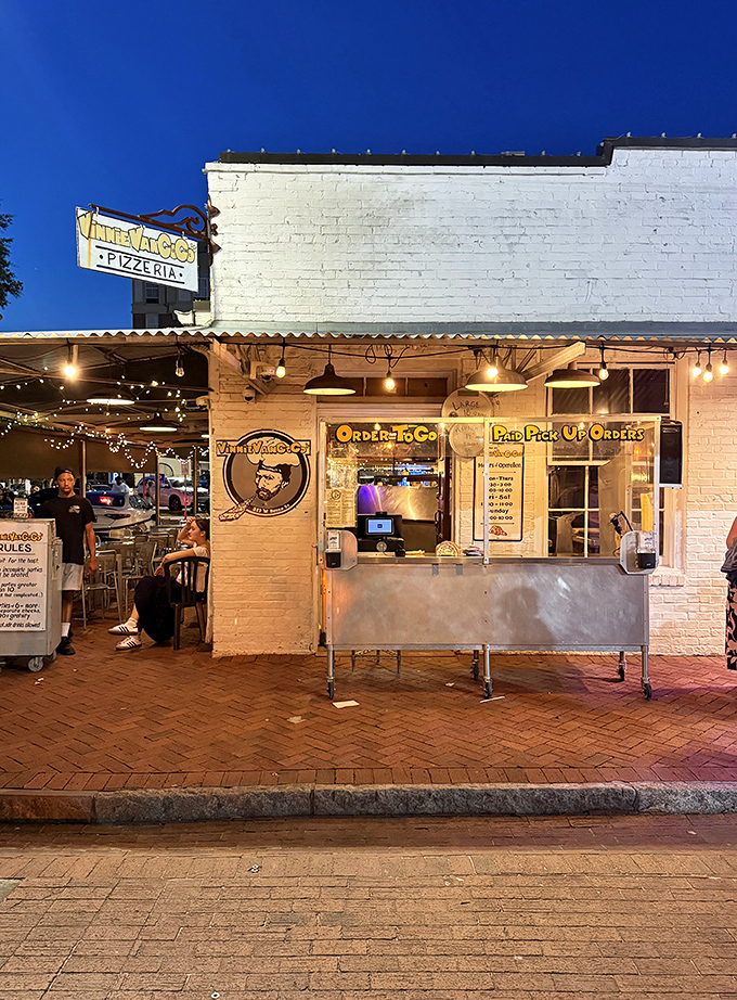 Evening lights transform this cart into a beacon of hope for hungry souls wandering Georgia's most charming city.