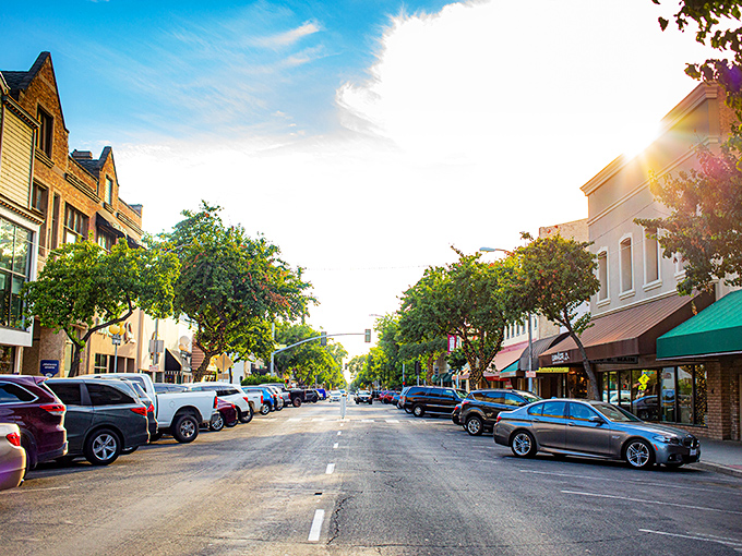 Golden hour paints Visalia's main street with the warm glow of possibility&mdash;where small-town charm meets big-time retirement potential.